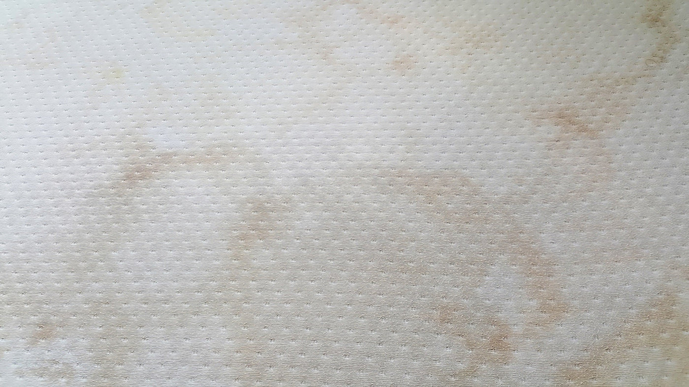 How to Get Yellow Stains Out of a Mattress & Top Causes | Casper
